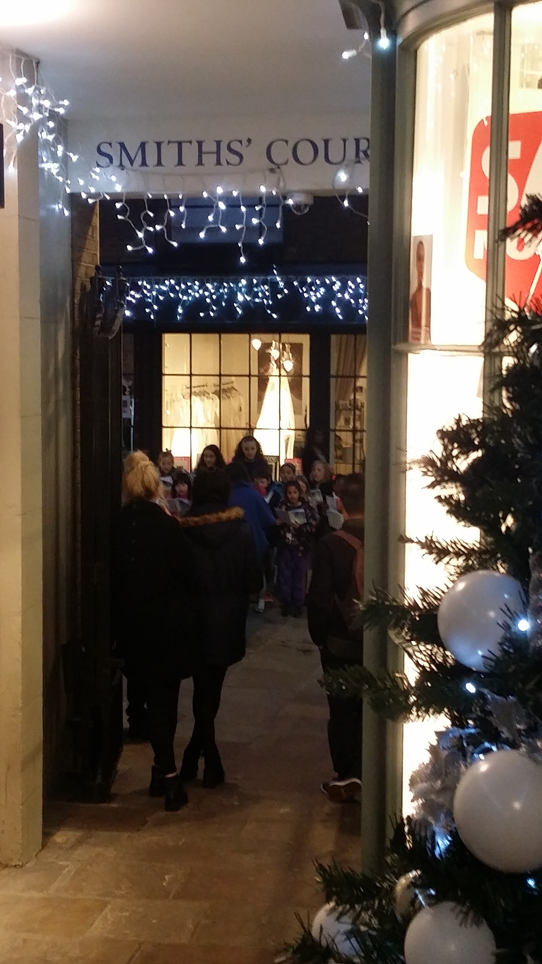 Christmas Carols at Smiths’ Court Soho London | Brecker Grossmith